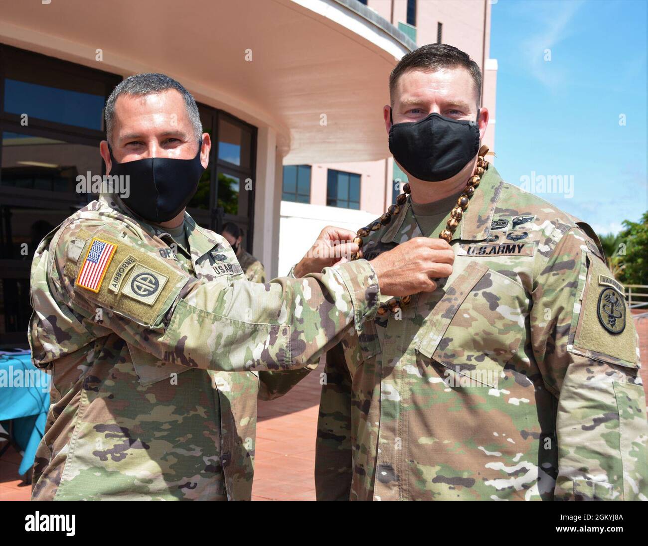 Col. Martin Doperak gives a lei to honor Maj. A.J. Galdi for being ...