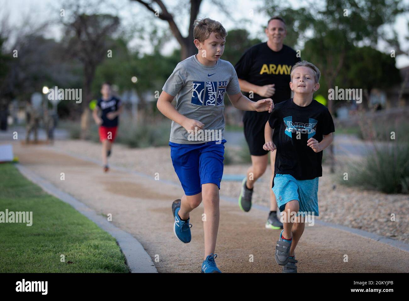 Harper Babb, 11, encourages little brother Finley, 5, during a morning ...