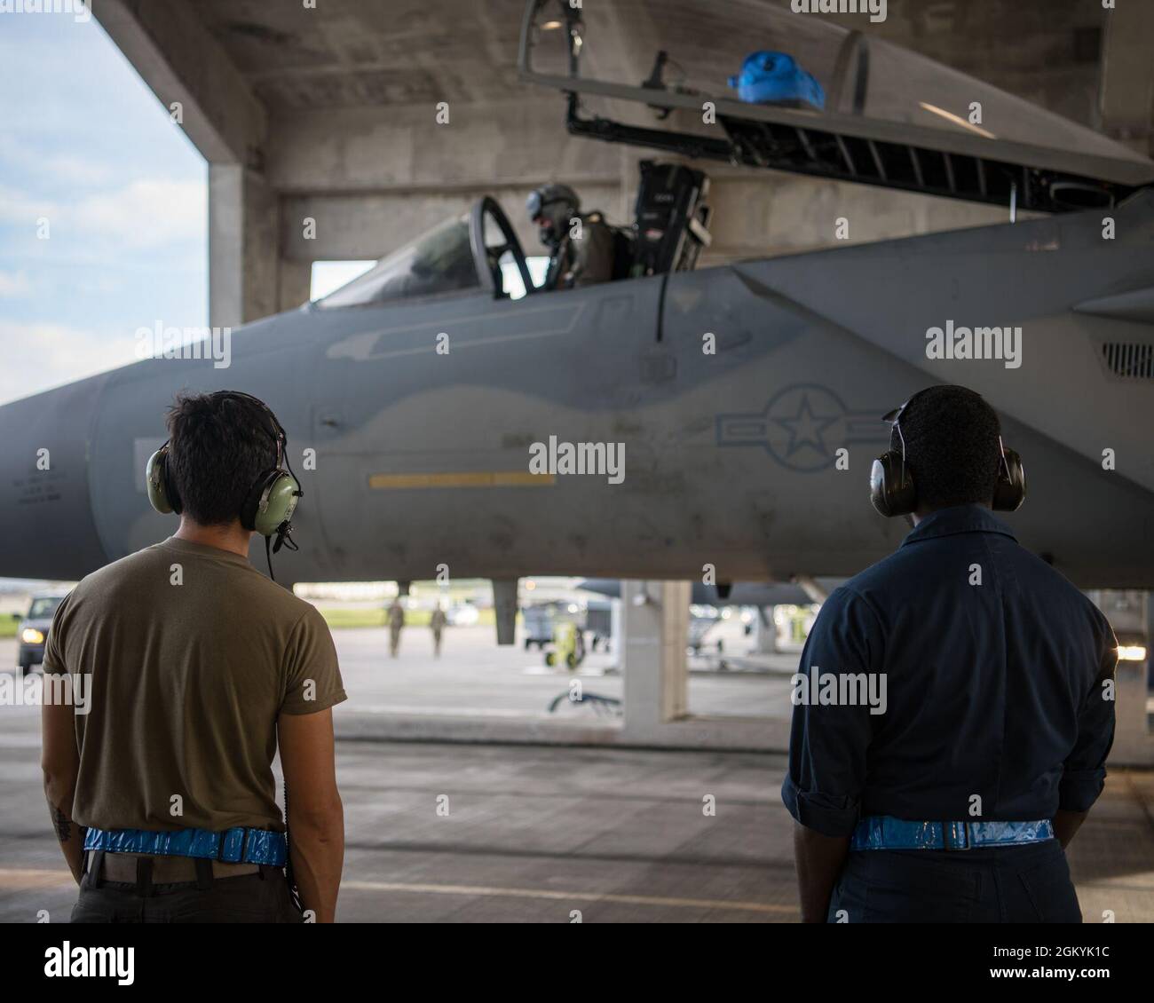 U.S. Air Force Airmen from the 44th Aircraft Maintenance Unit stand by ...