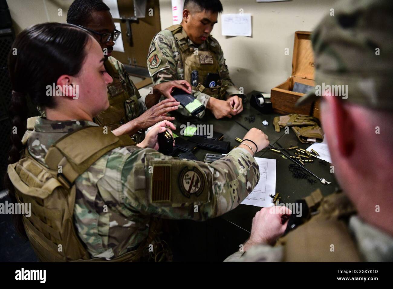 8th Security Forces Squadron defenders load their magazines with ...