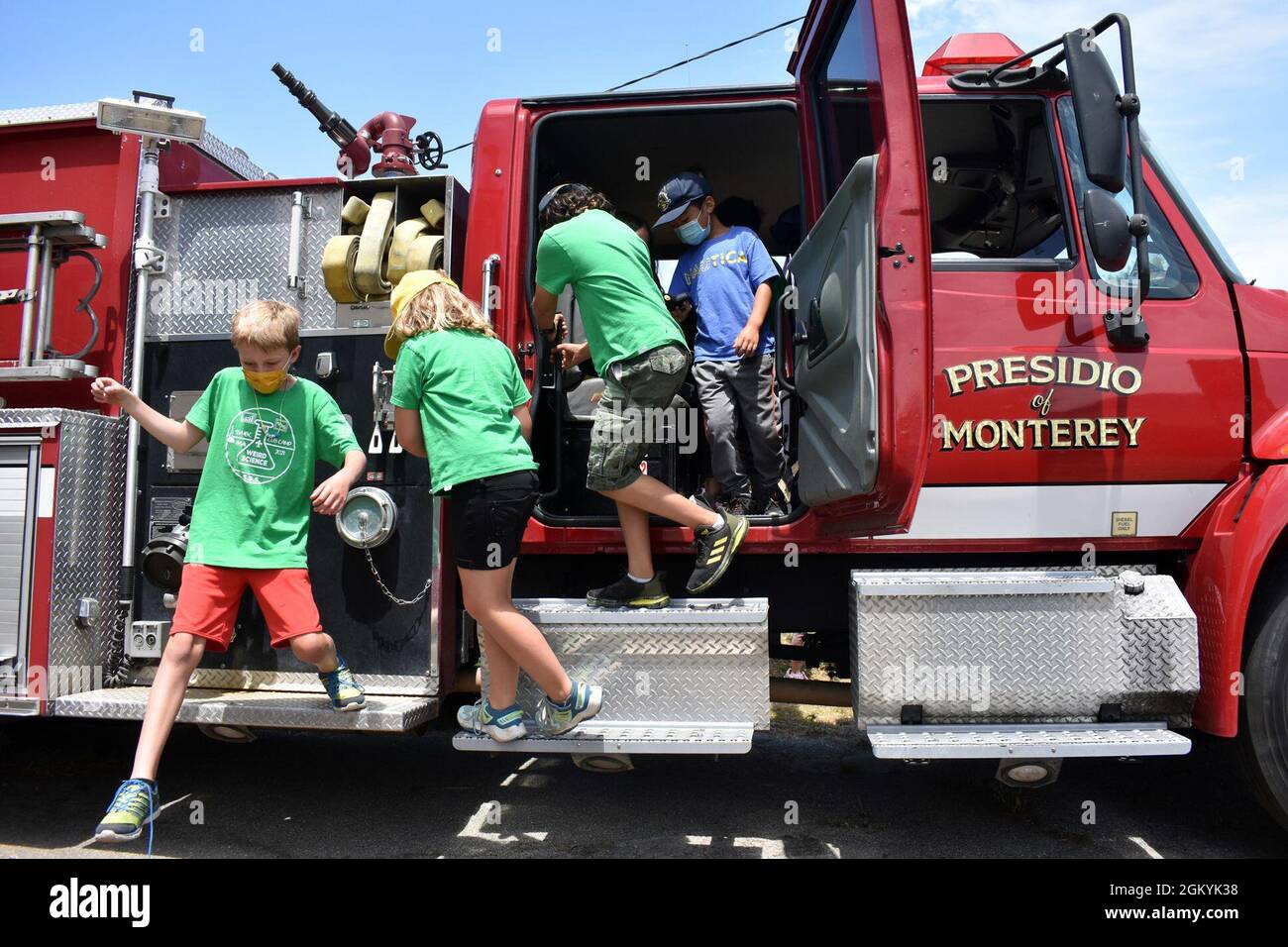 Cub Scouts exit a Presidio of Monterey Fire Department fire truck ...
