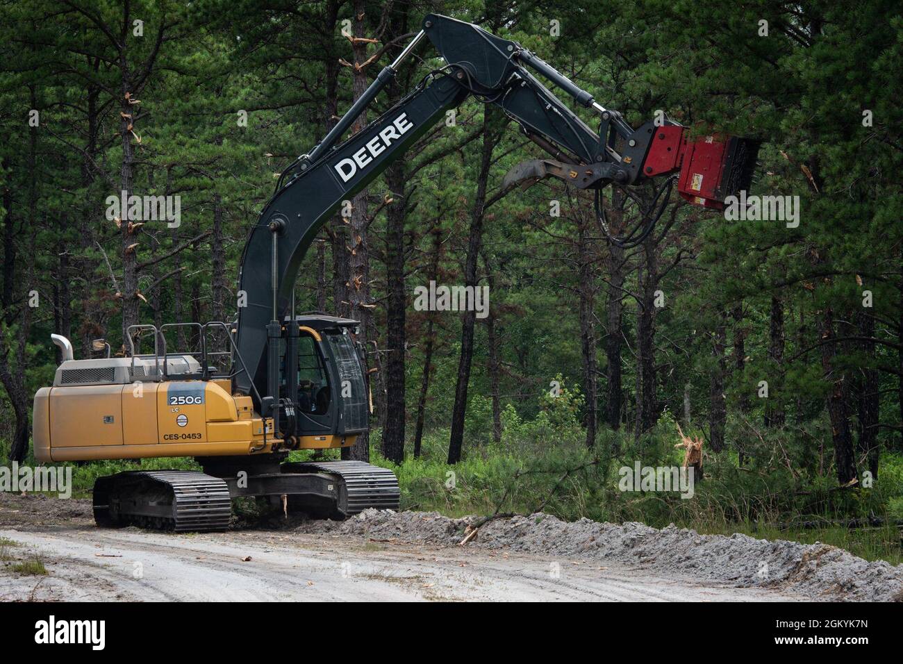 Range support personnel clear trees during fire break maintenance at ...