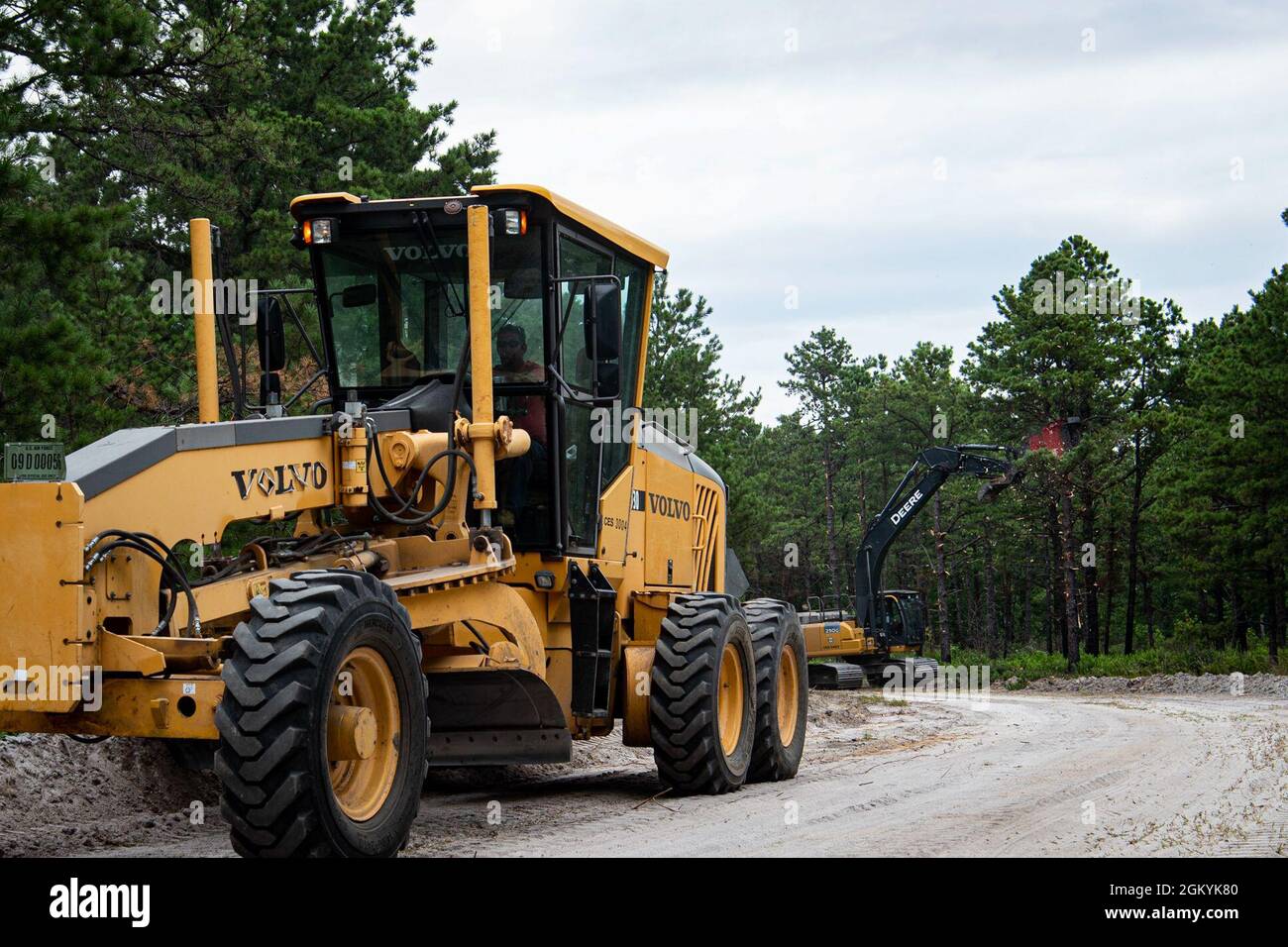 Range support personnel perform fire break maintenance at Joint Base ...