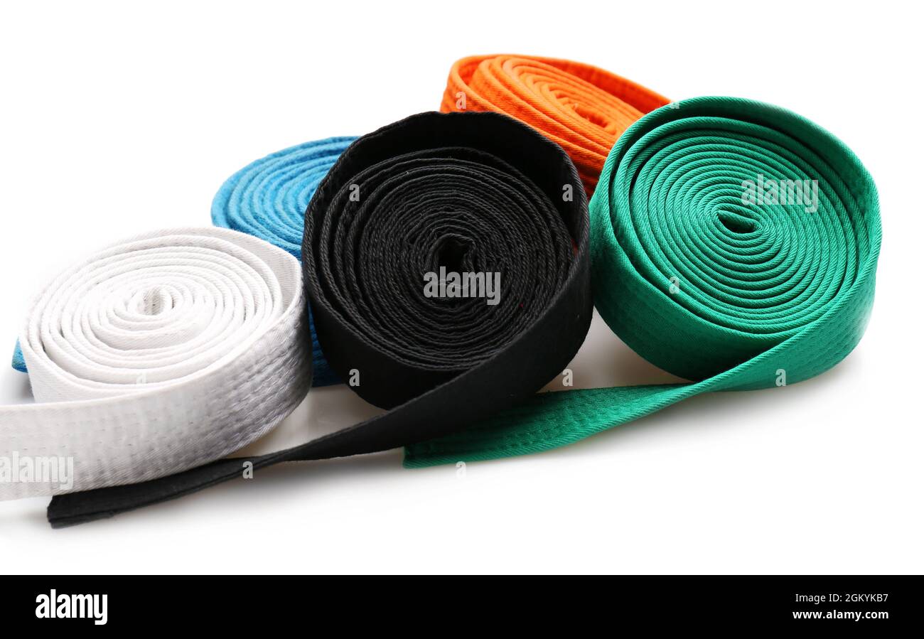 Different colorful karate belts on white background Stock Photo - Alamy