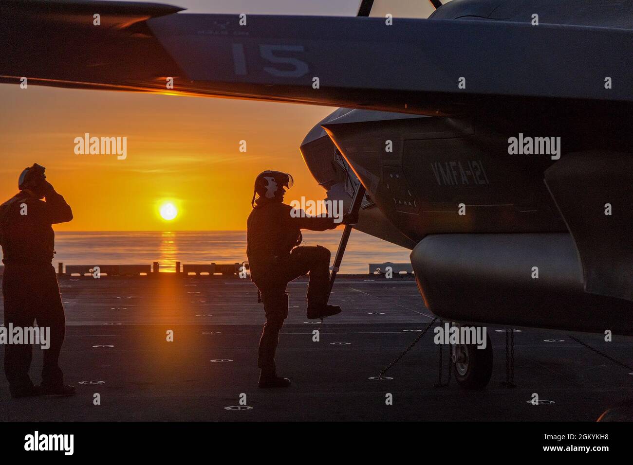 U.S. Marine Corps pilot Capt. Benjamin Hassel and F-35B aircraft ...