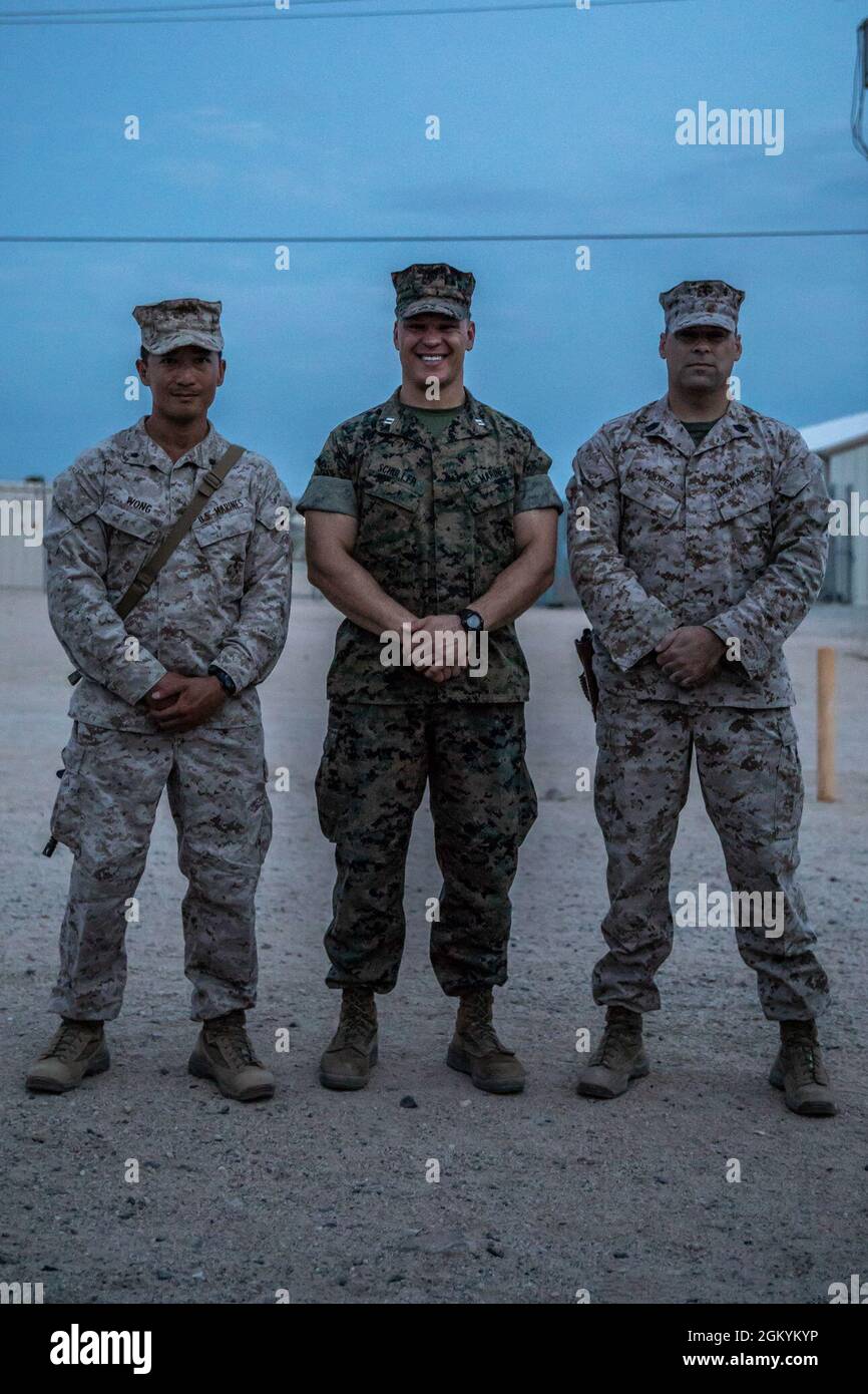 Capt. Jeffrey Schuller poses with leadership from 3rd Battalion, 25th ...