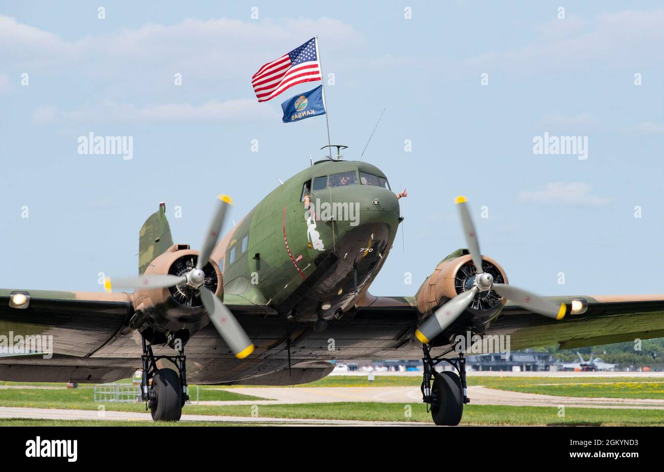 An AC-47 from Topeka, Kansas, lands after conducting a legacy flight ...