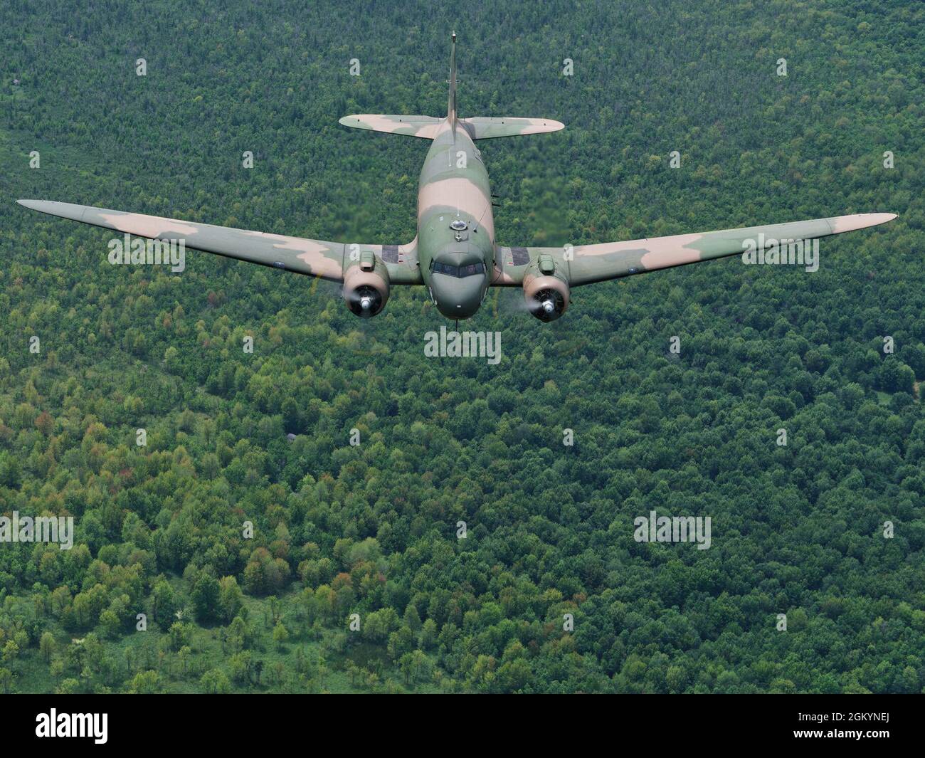 An AC-47 from Topeka, Kansas soars over interior Wisconsin during EAA ...