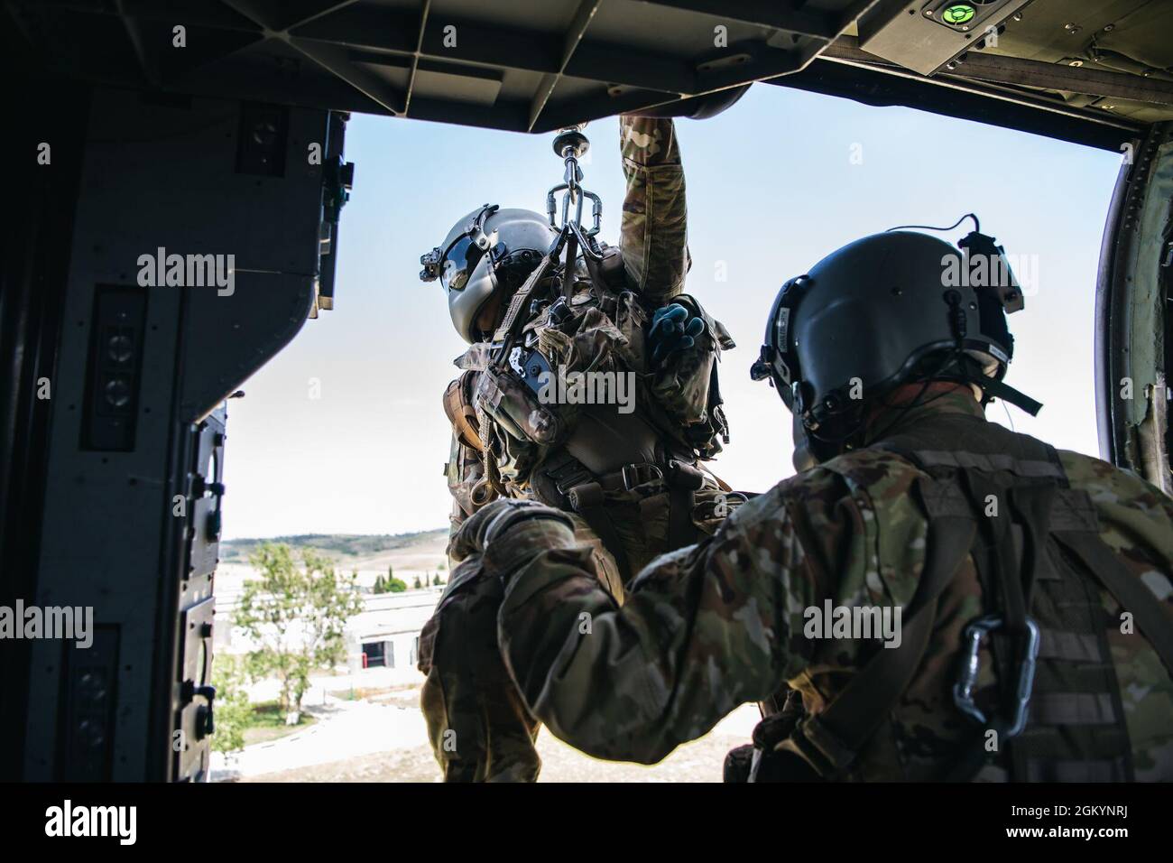 A U.S. Army helicopter crew member assigned to 1st Combat Aviation ...