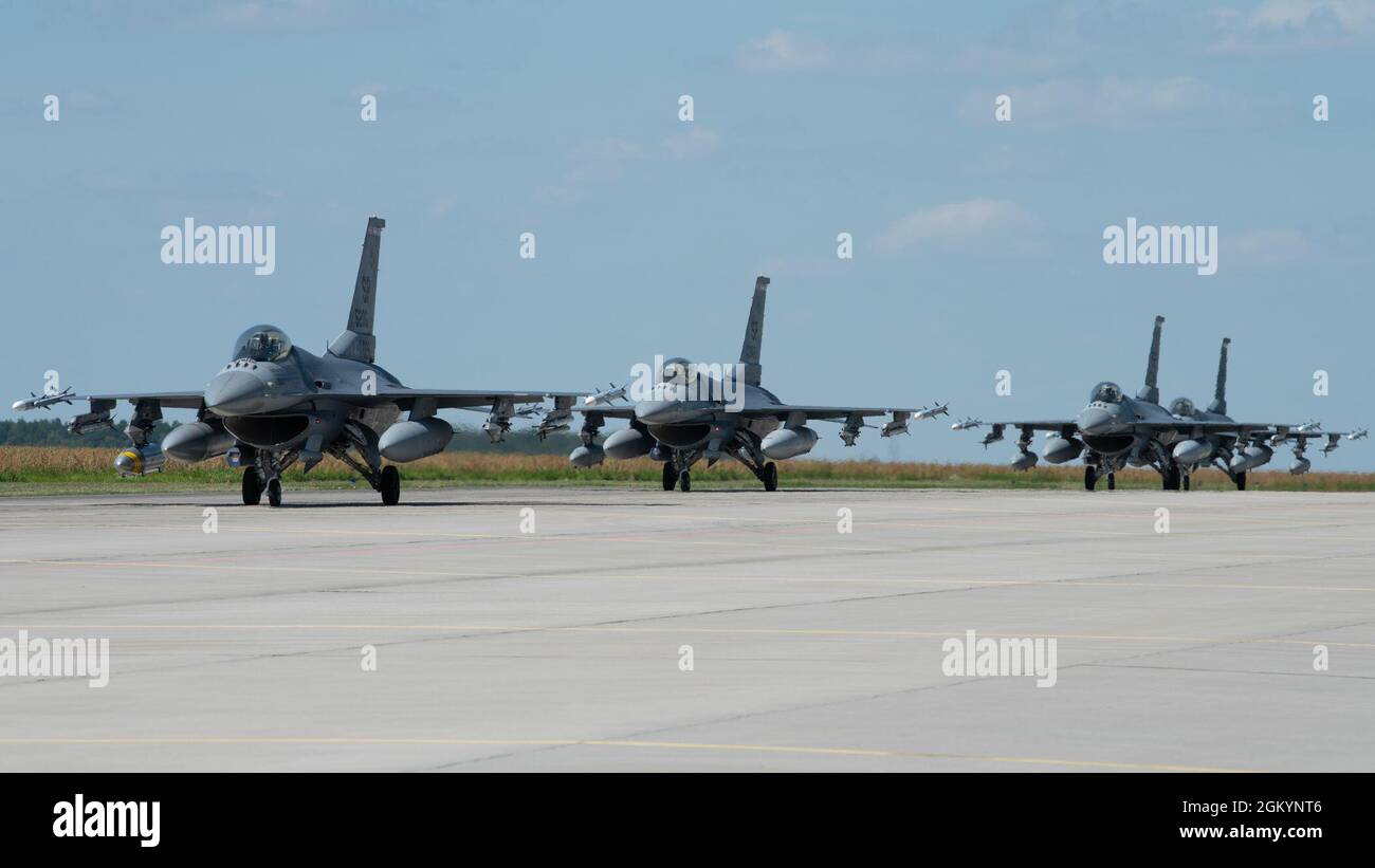 Four F-16 Fighting Falcon aircraft assigned to the 480th Fighter ...