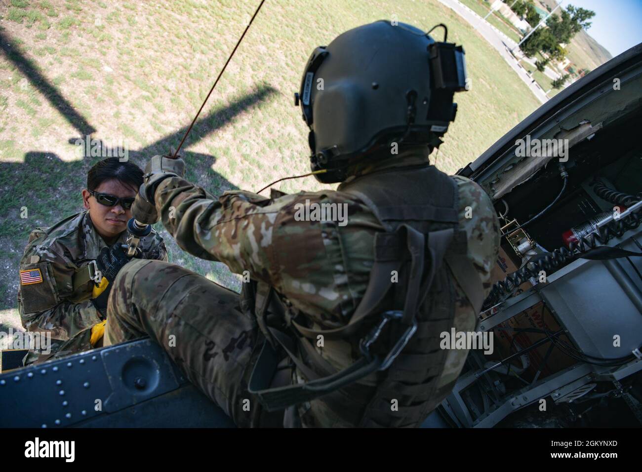 A U.S. Army helicopter crew member assigned to 1st Combat Aviation ...