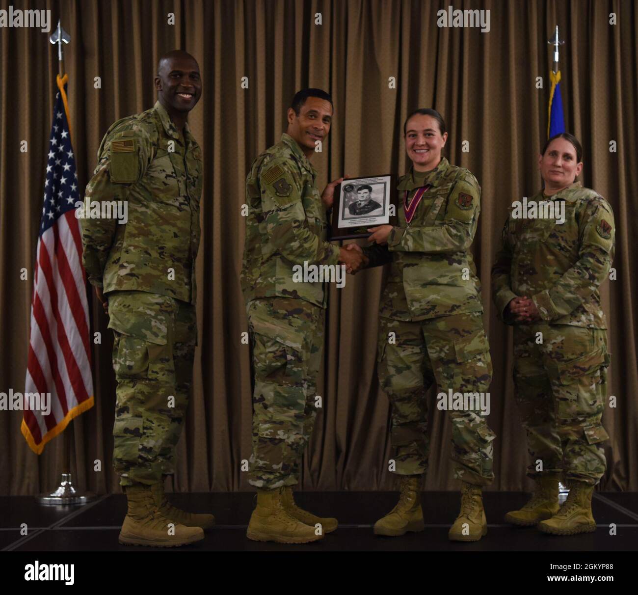 Col. Timothy Curry, 319th Reconnaissance Wing commander, presents ...