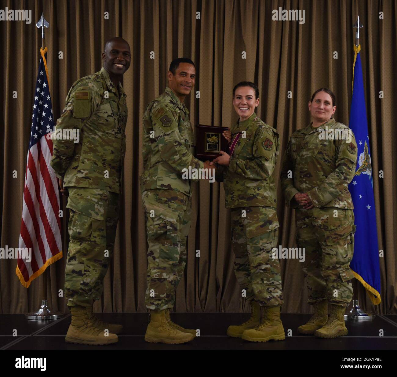 Col. Timothy Curry, 319th Reconnaissance Wing commander, presents ...