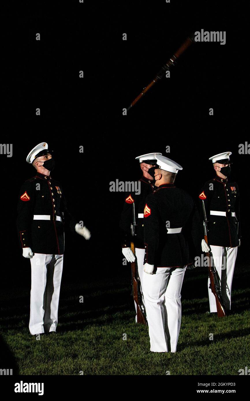 Marines with the Silent Drill Platoon execute their “rifle inspection ...