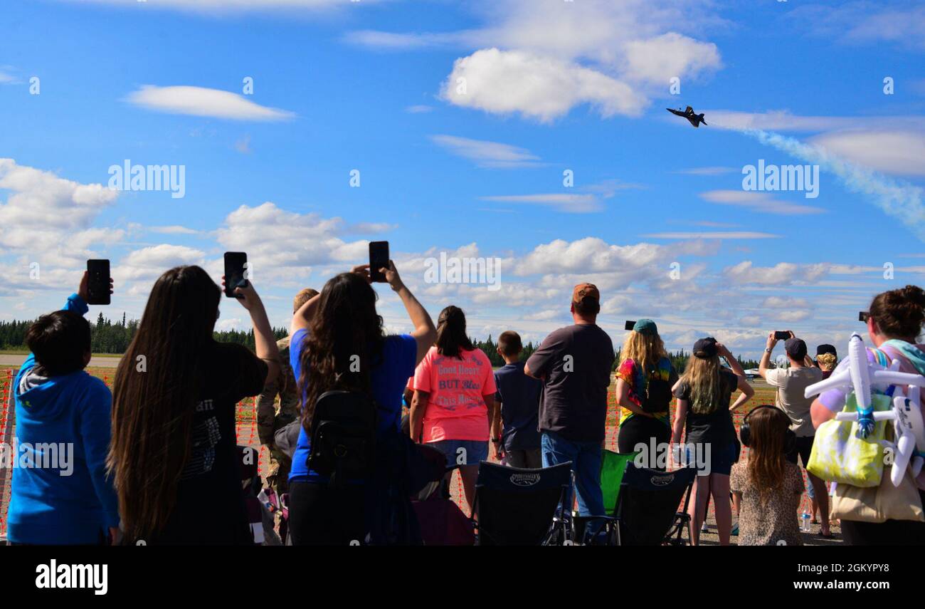 A crowd watches the U.S. Navy Air Demonstration Squadron, the Blue ...