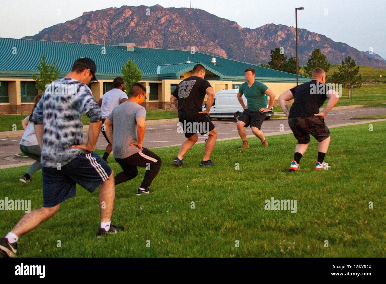 A 10th Special Forces Group (A) Soldier leads physical training during ...