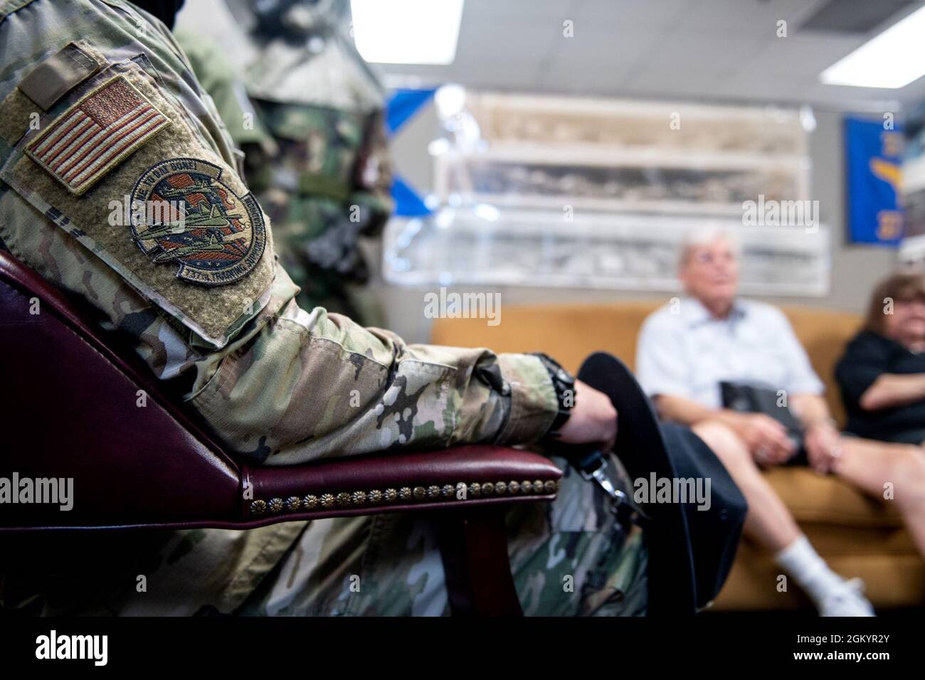 Thomas Coons (center), senior master sergeant, retired, and his wife ...