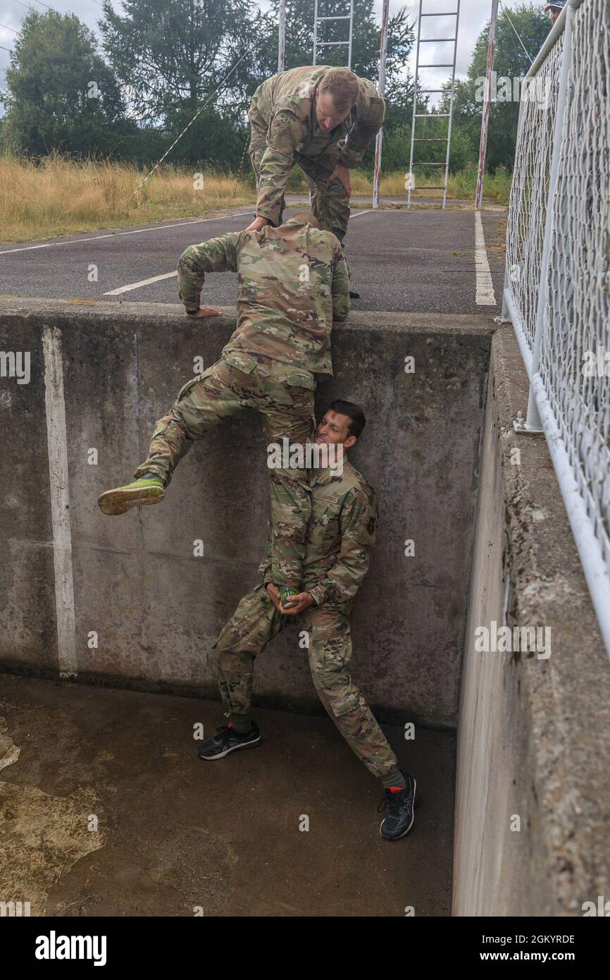 A team representing the United States of America, navigates an obstacle ...