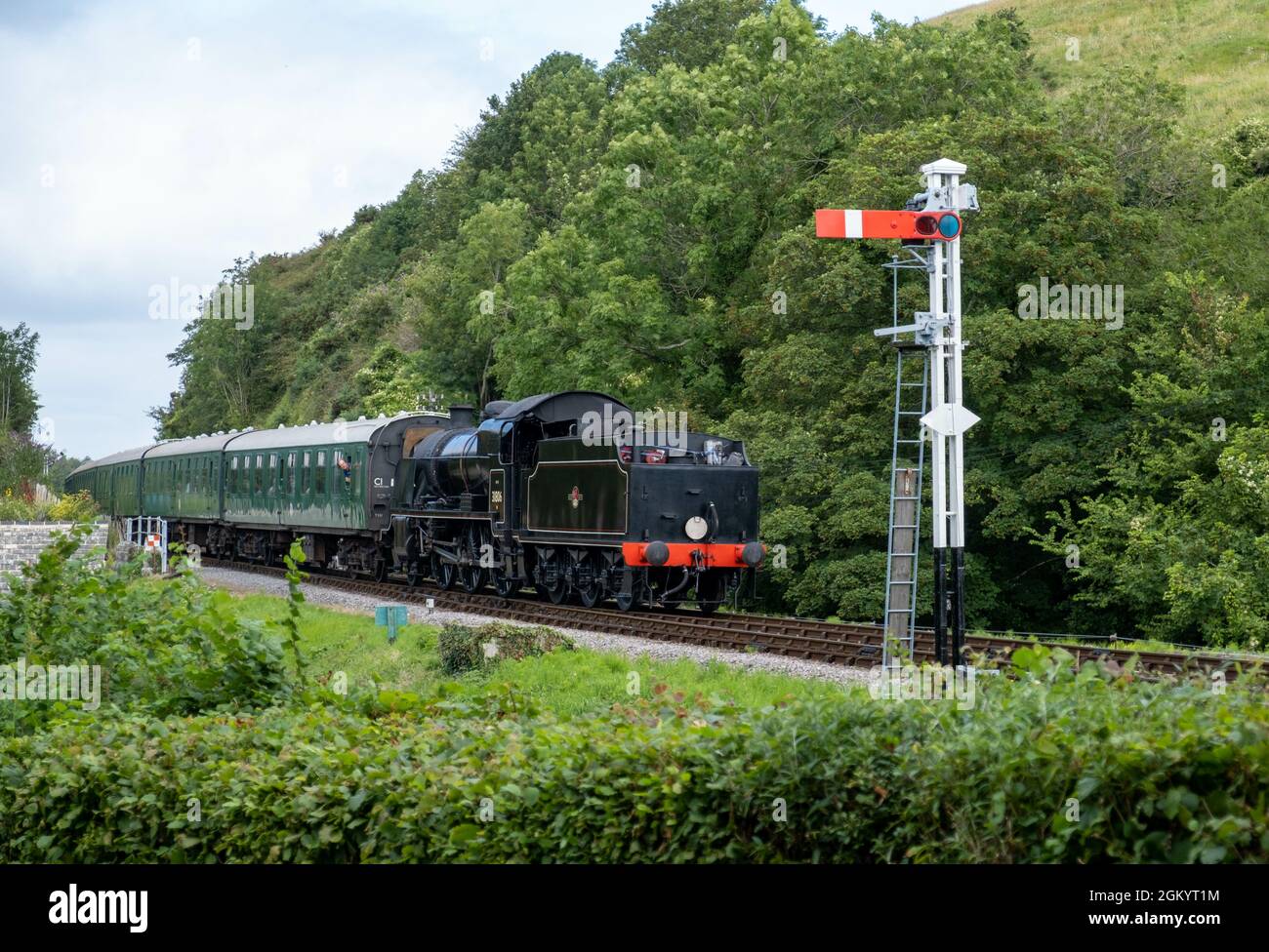 CORFE CASTLE, UNITED KINGDOM - Aug 18, 2021: A steam train arriving at ...