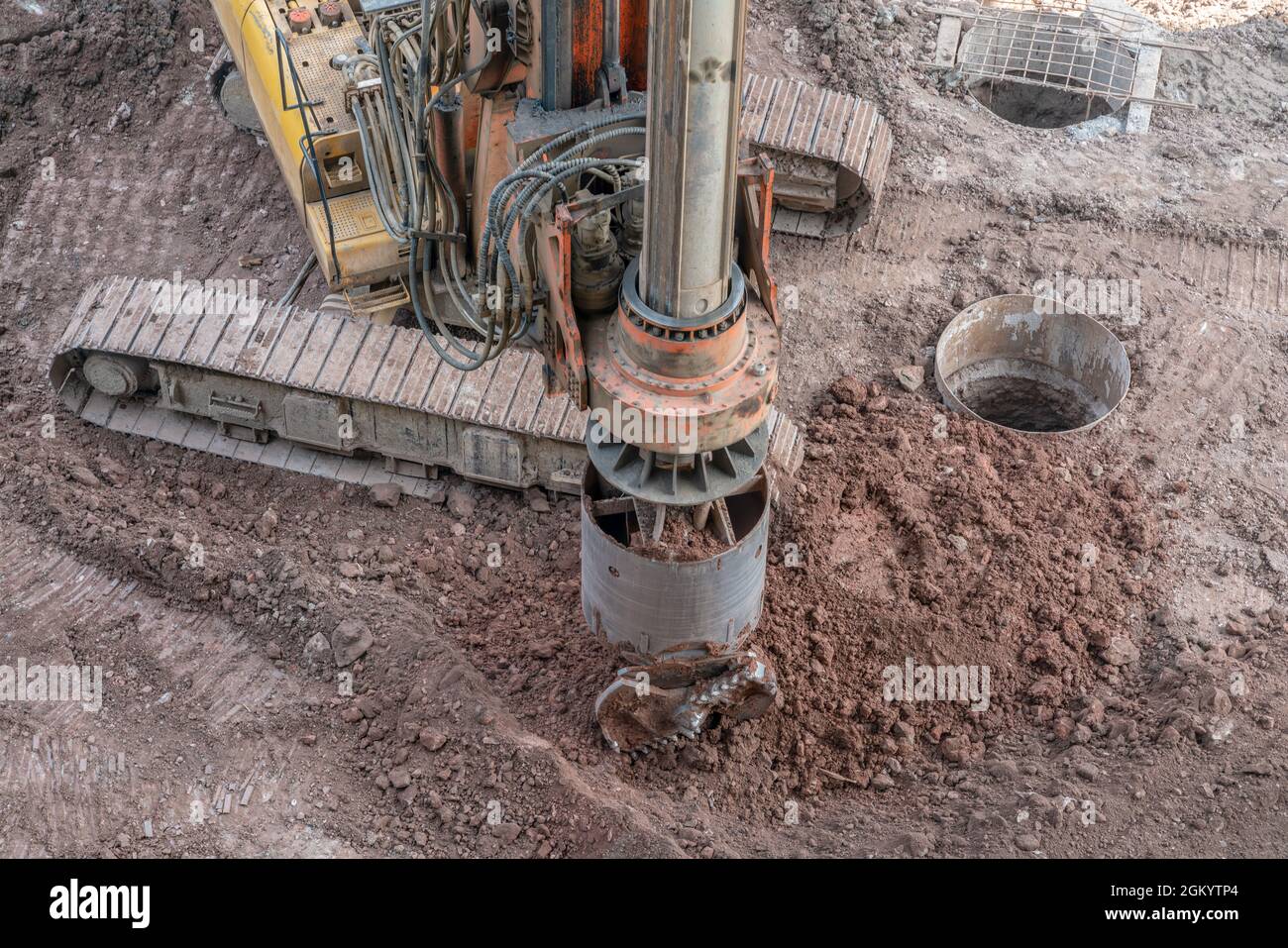 Heavy duty pile drilling machine, making a hole in the ground at a ...