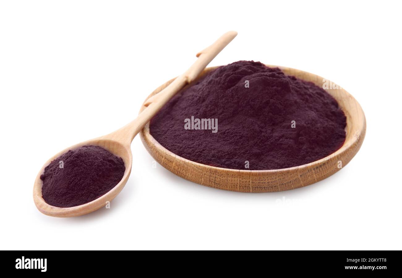 Wooden spoon and plate with acai powder on white background Stock Photo ...