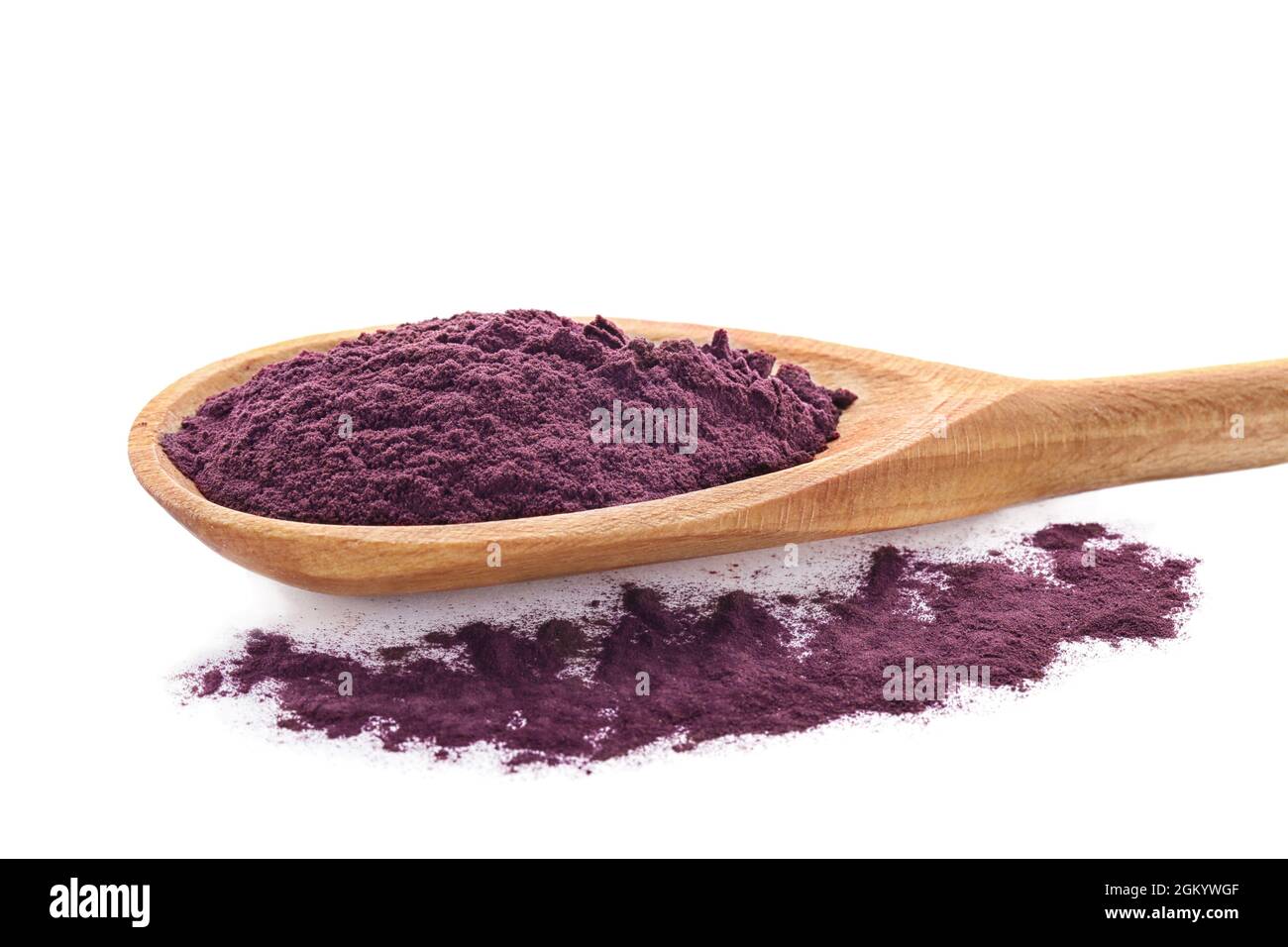 Wooden spoon and acai powder on white background Stock Photo - Alamy