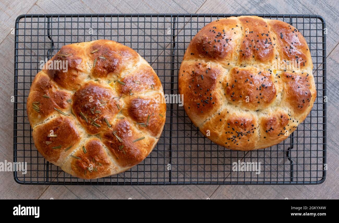 Two traditional round home baked Challah bread loaves for Jewish New ...