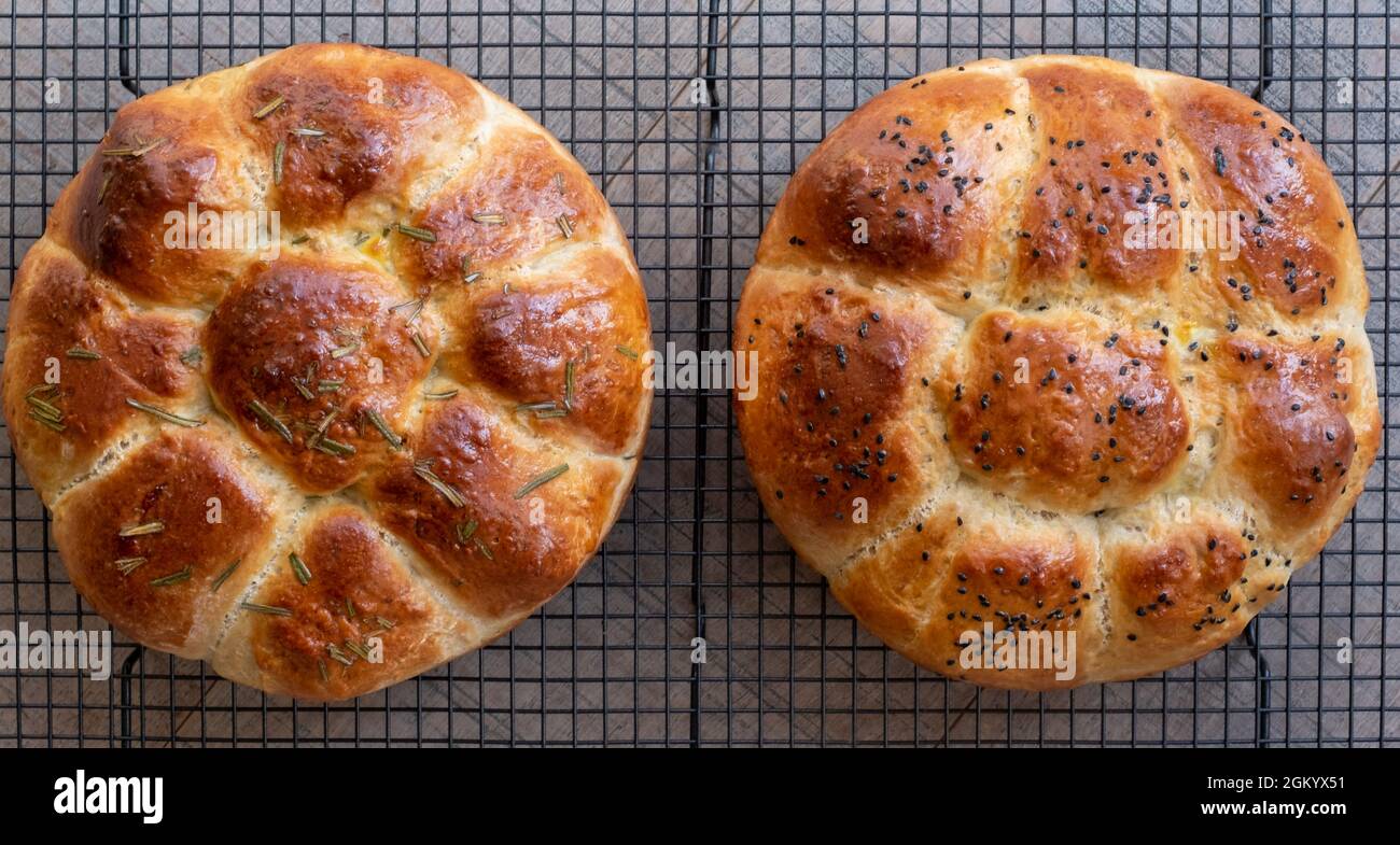 Two traditional round home baked Challah bread loaves for Jewish New ...