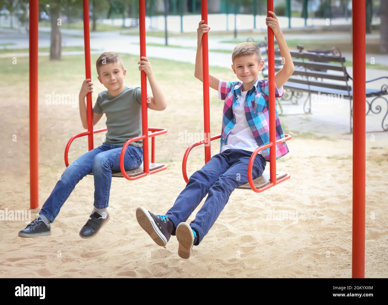 Cute boys on playground Stock Photo - Alamy
