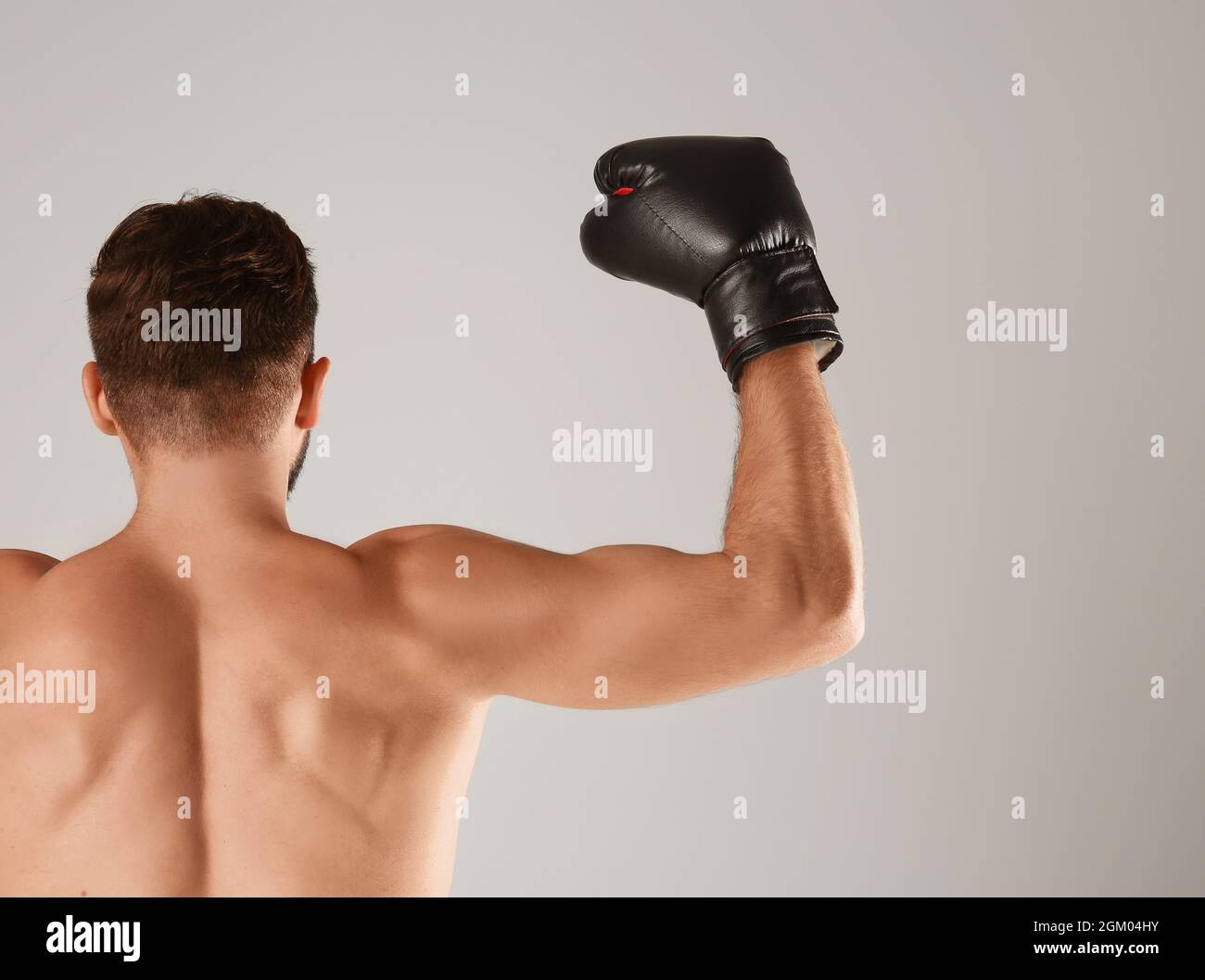 Male boxer on light background Stock Photo - Alamy