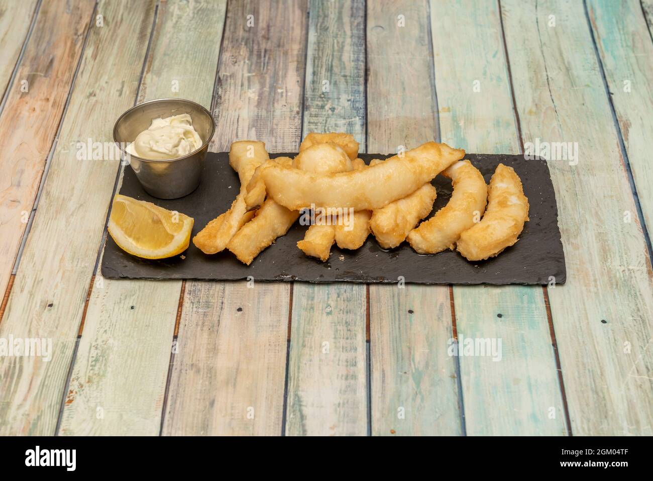 Great and fat squid squid battered and fried in olive oil with lemon ...