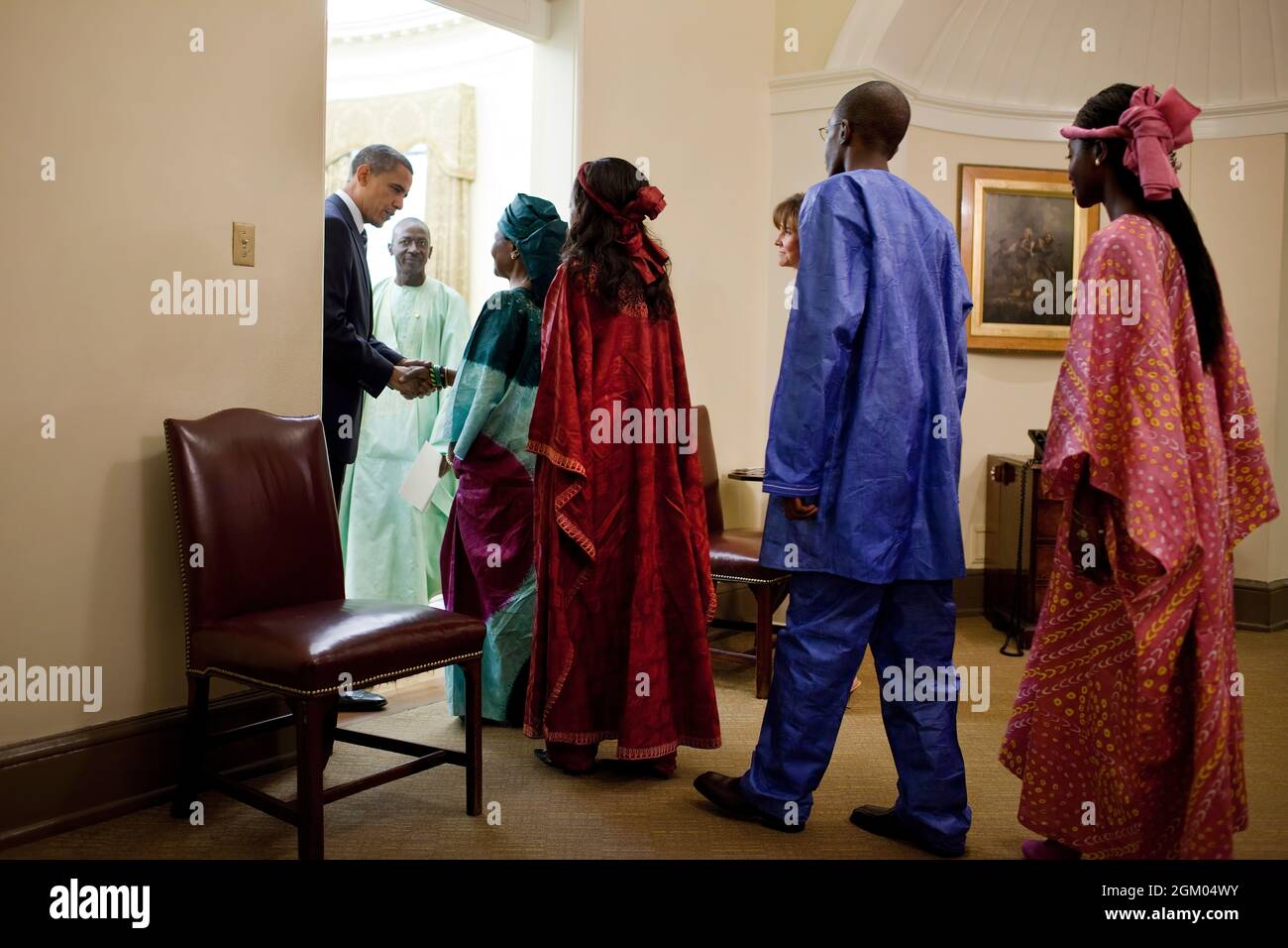 President Barack Obama greets Ambassador Alieu Momodou Ngum, of ...