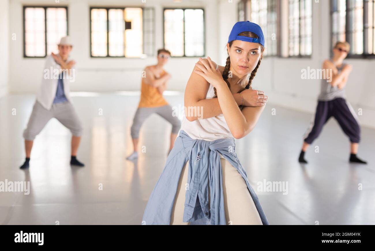 Group of young artists performing street dance Stock Photo - Alamy