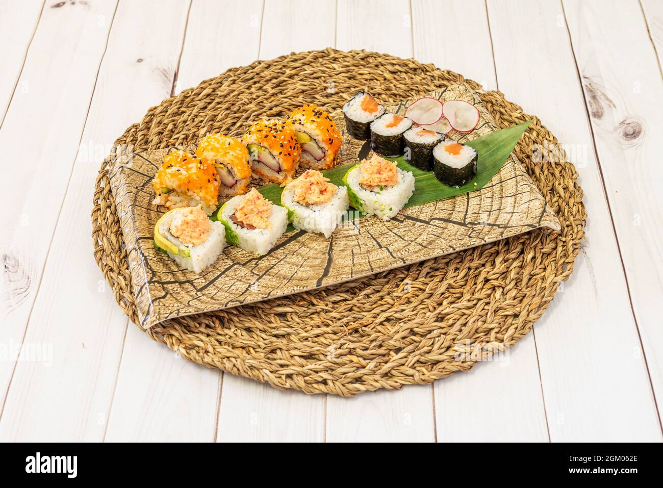 Assorted sushi mix tray with salmon nigiri, uramaki california roll ...