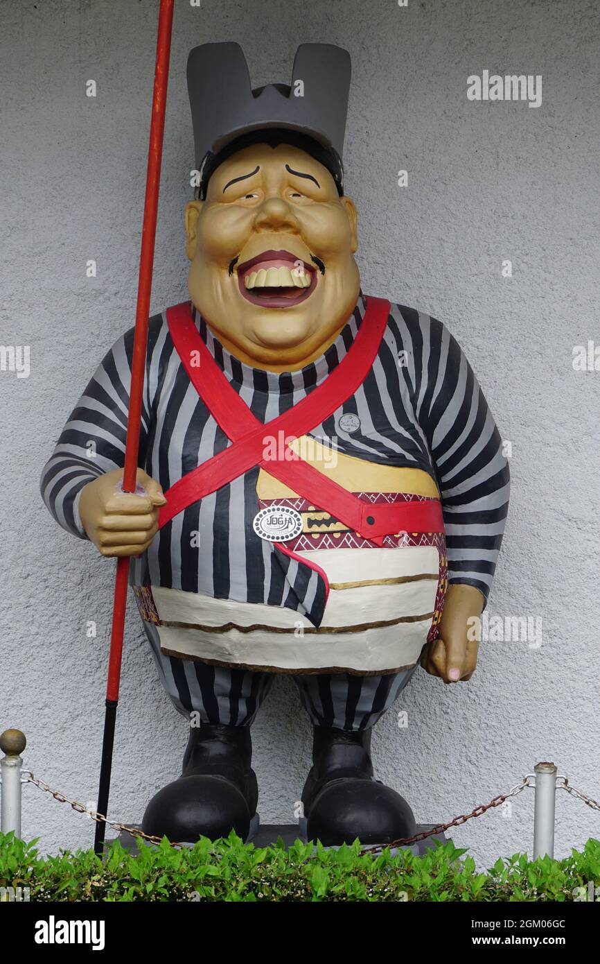 The statue of ancient javanese soldier Stock Photo - Alamy