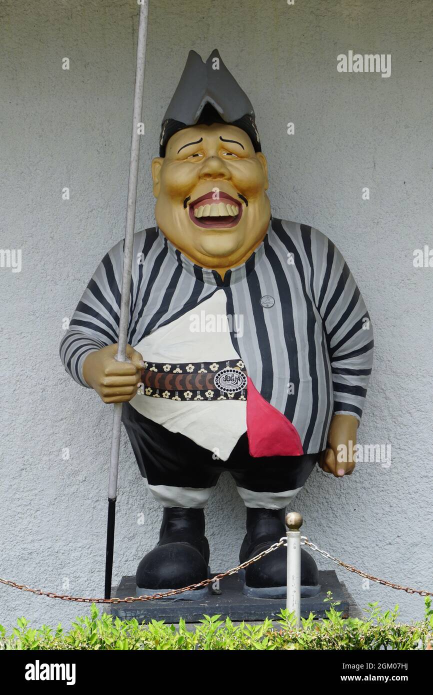 The statue of ancient javanese soldier Stock Photo - Alamy