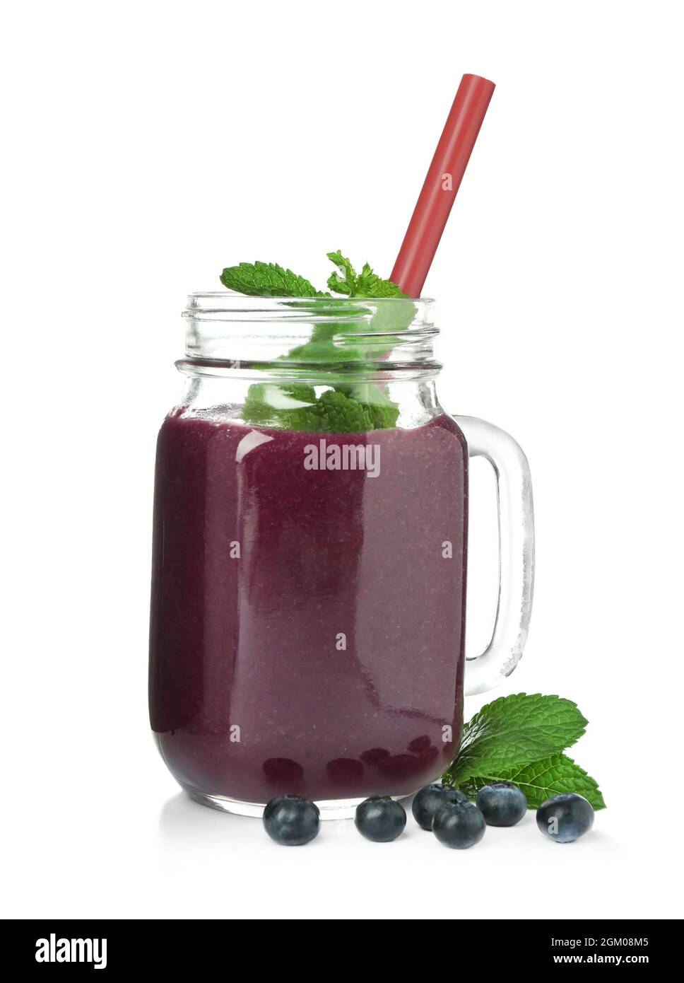 Mason jar with acai juice on white background Stock Photo - Alamy
