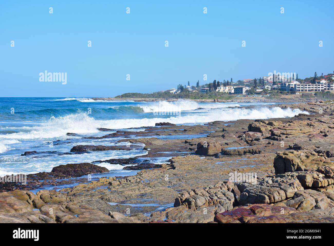 Waves Crashing Over The Uvongo Beach Rocks, South Africa Stock Photo ...