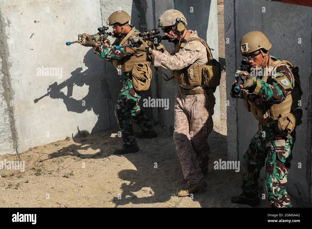 A U.S. Marine with 1st Reconnaissance Battalion (1st Recon Bn.), 1st Marine Division, and ...