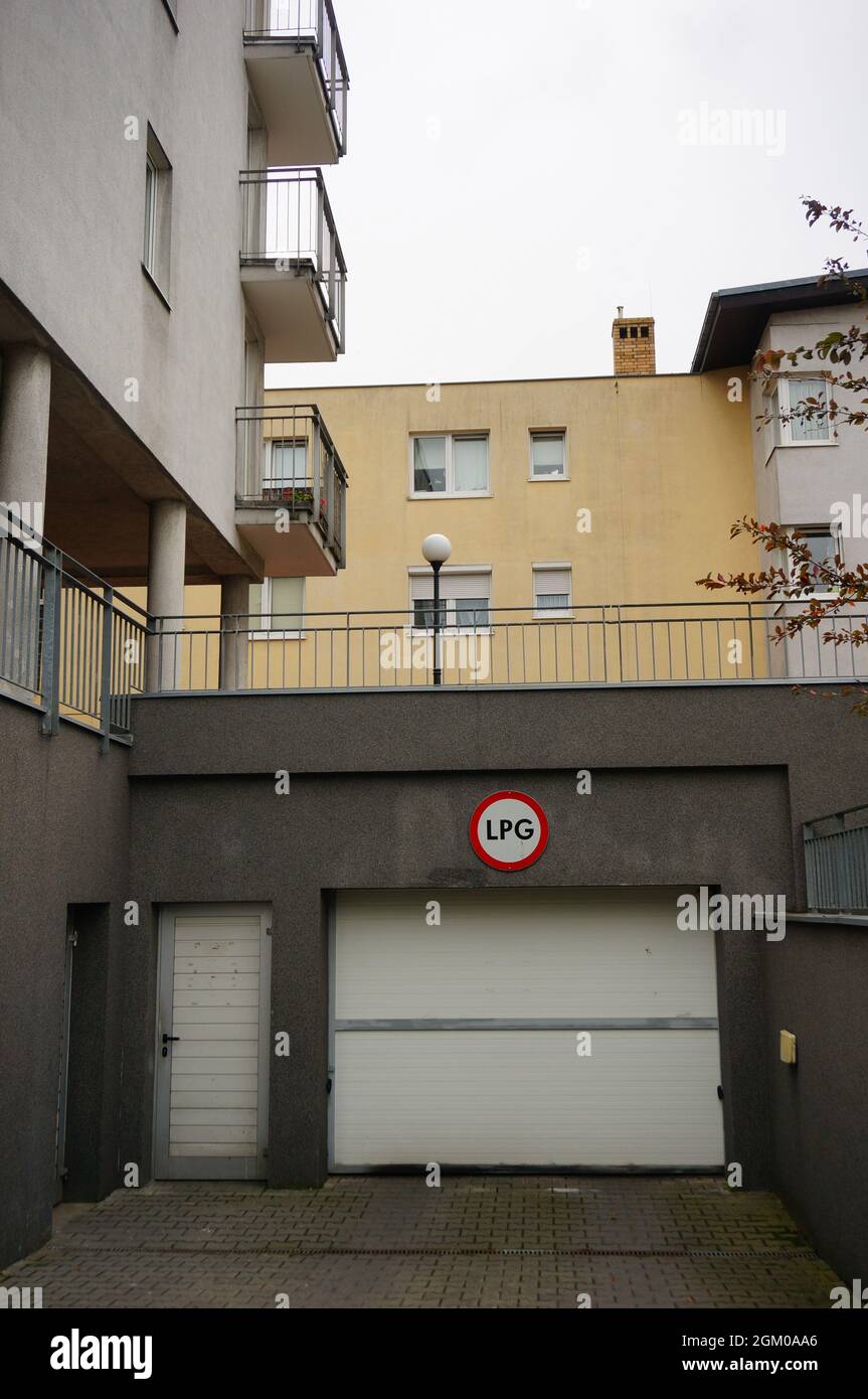 Closeup of a garage entrance with LPG warning sign Stock Photo - Alamy