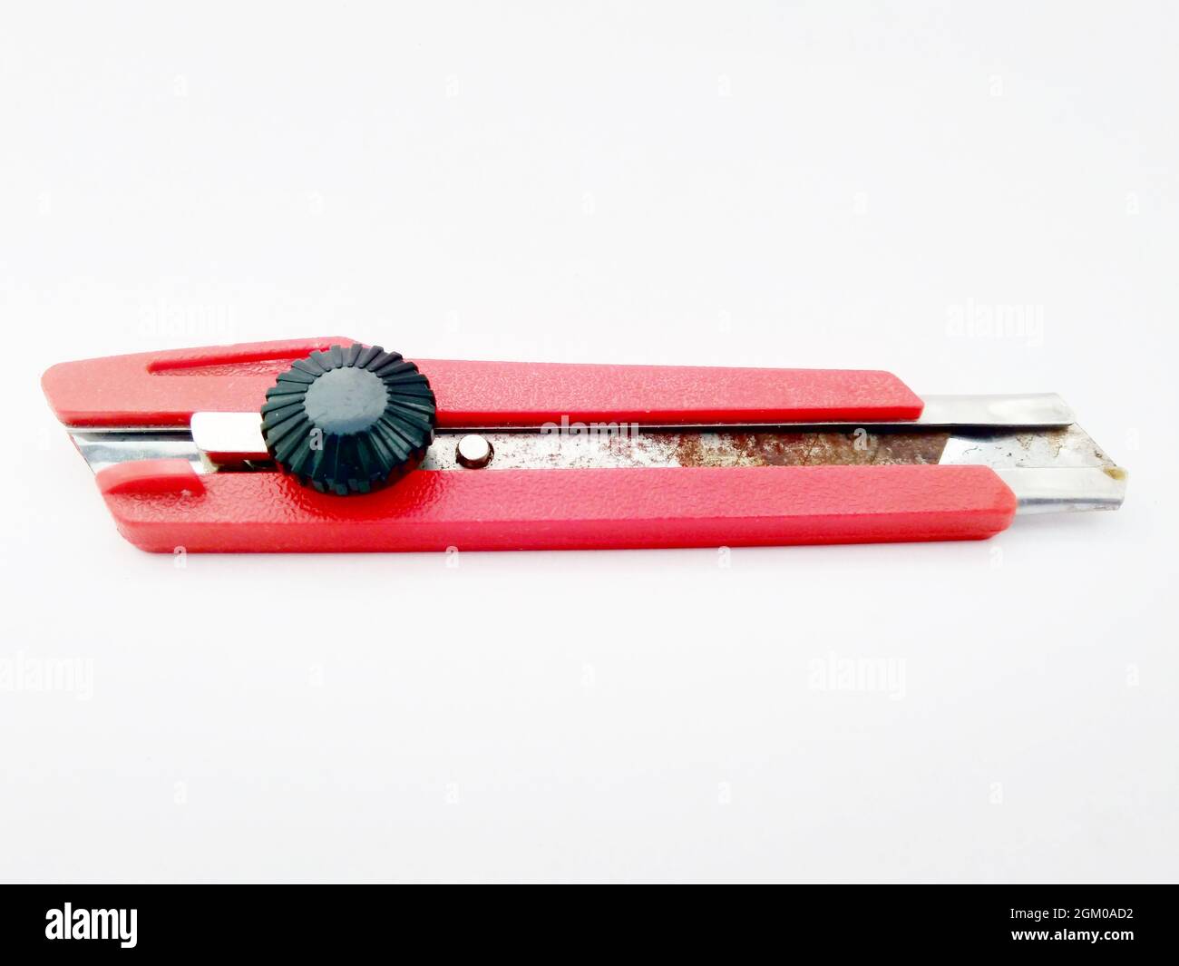 Used cutter on an isolated white background Stock Photo - Alamy