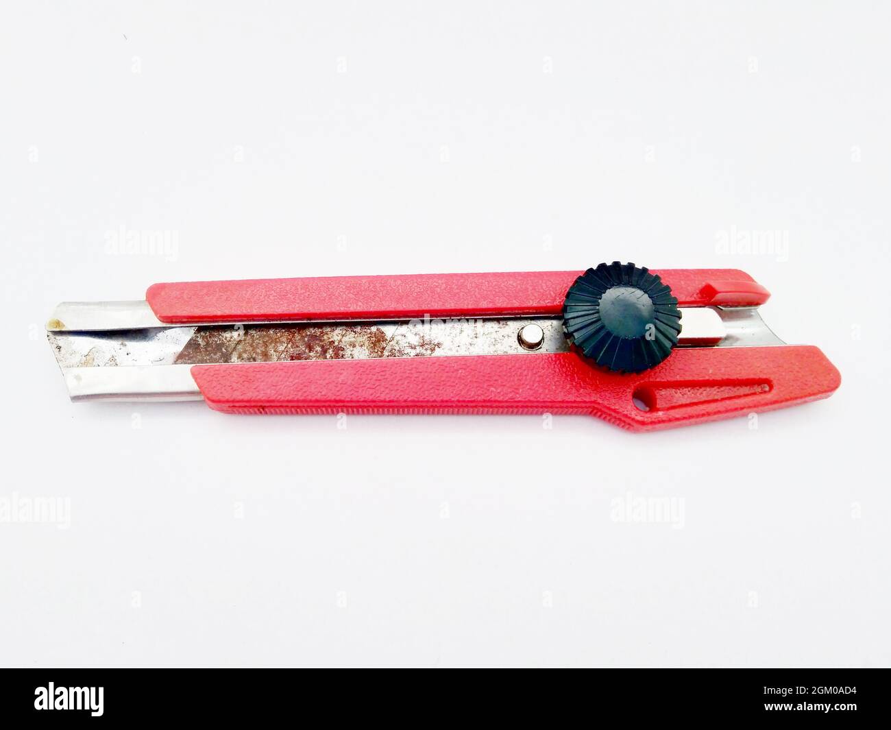 Used cutter on an isolated white background Stock Photo - Alamy