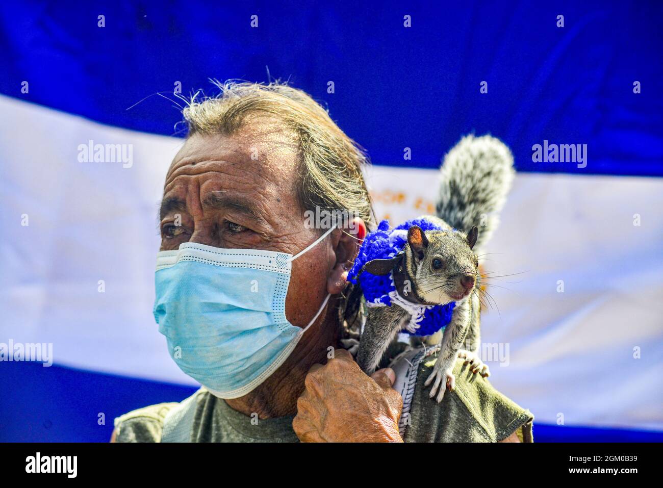 San Salvador, El Salvador. 15th Sep, 2021. A demonstrator with his pet ...