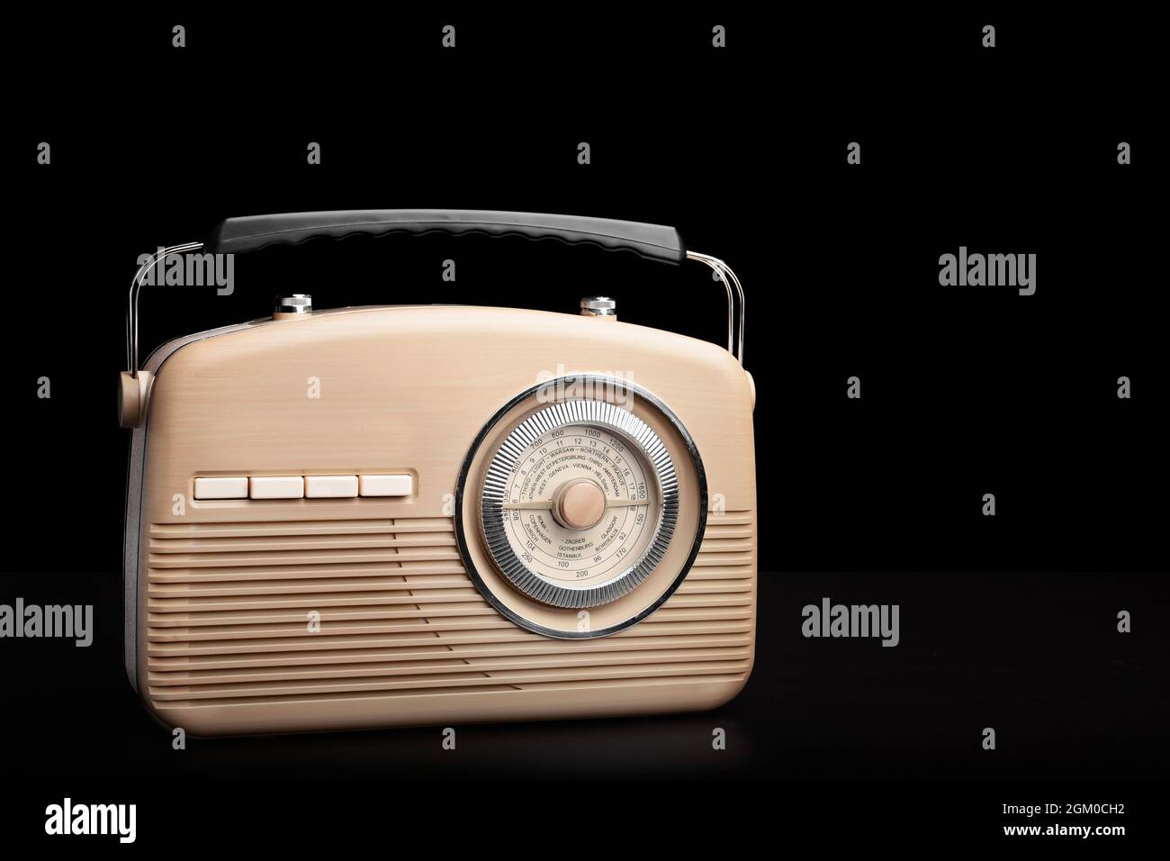 Retro radio on black background Stock Photo - Alamy