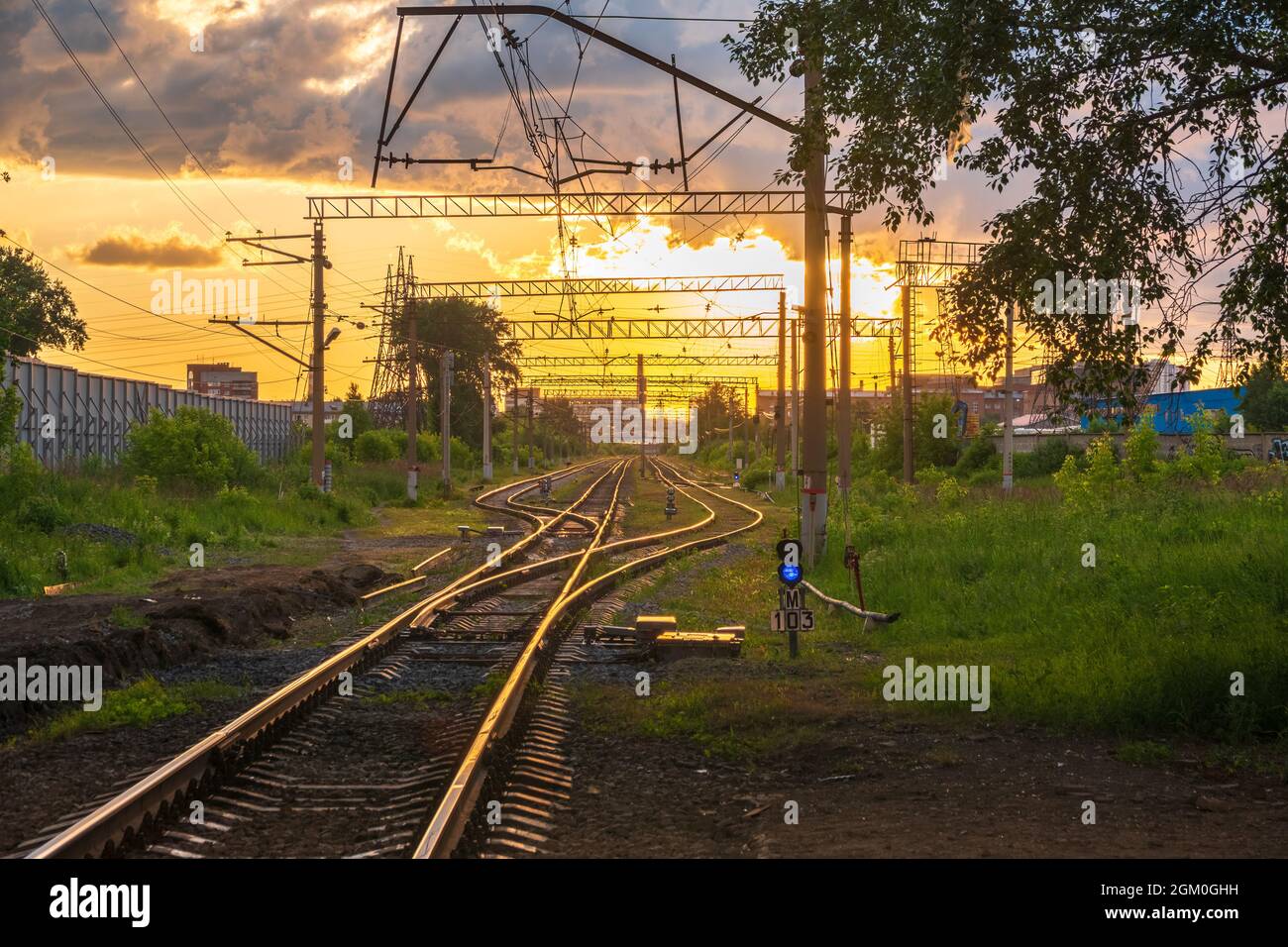 Sunset over the railway with a traffic light. Sunset Over Railway ...
