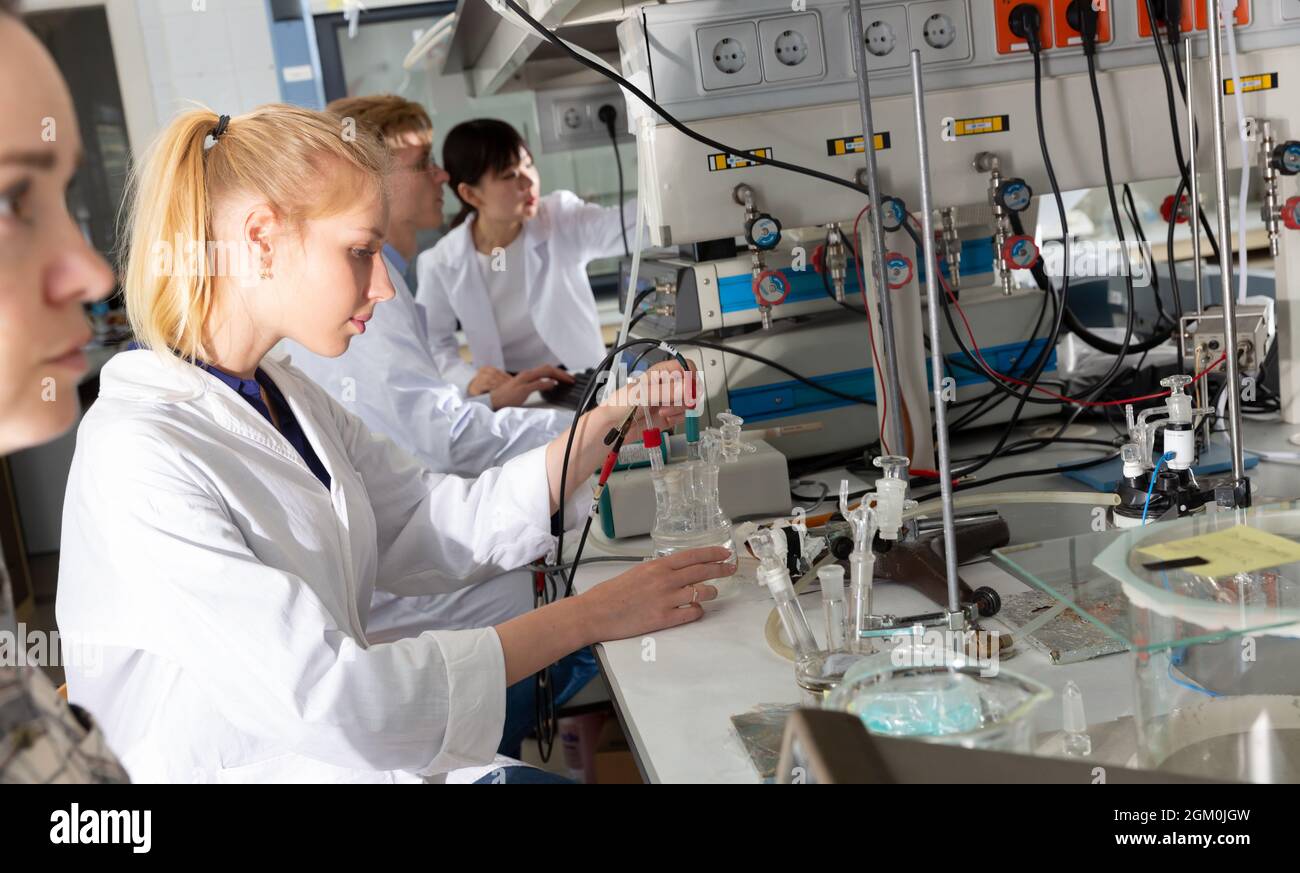 Students engaged in research at lab Stock Photo - Alamy