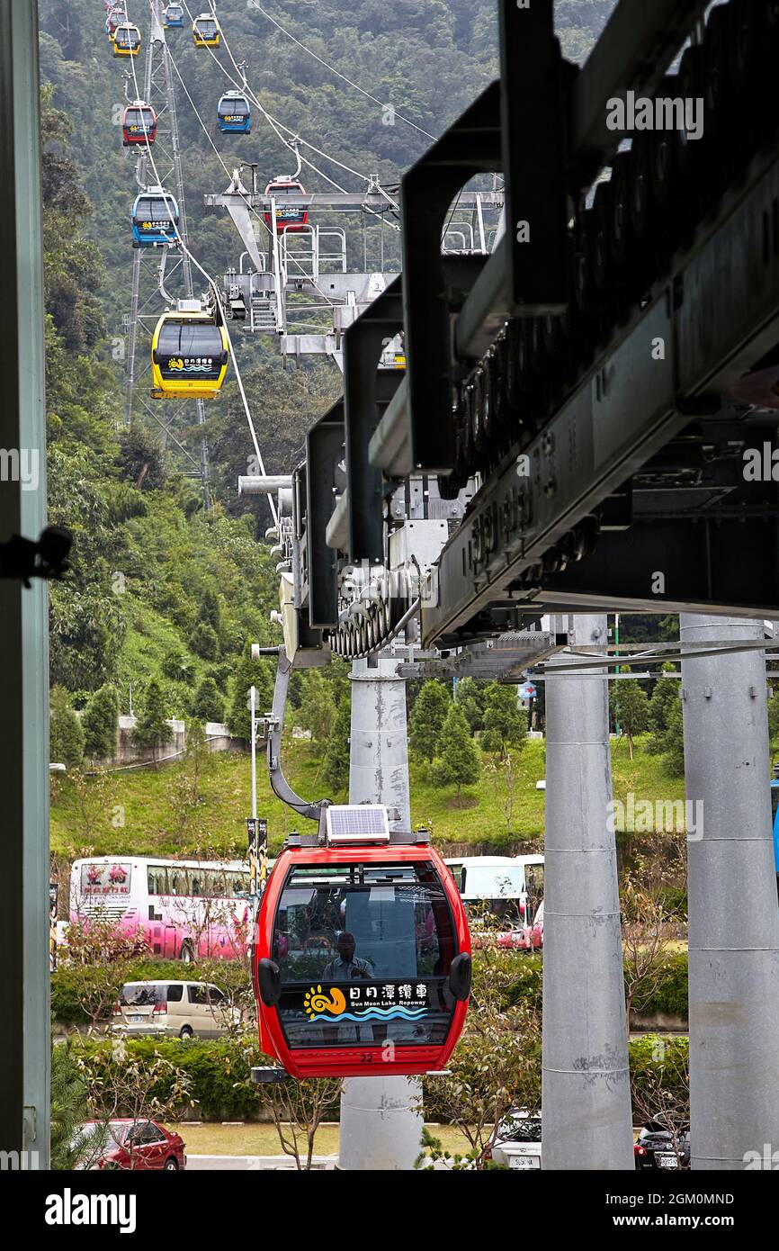 View of the cable cars approaching the ropeway station at the Sun Moon ...