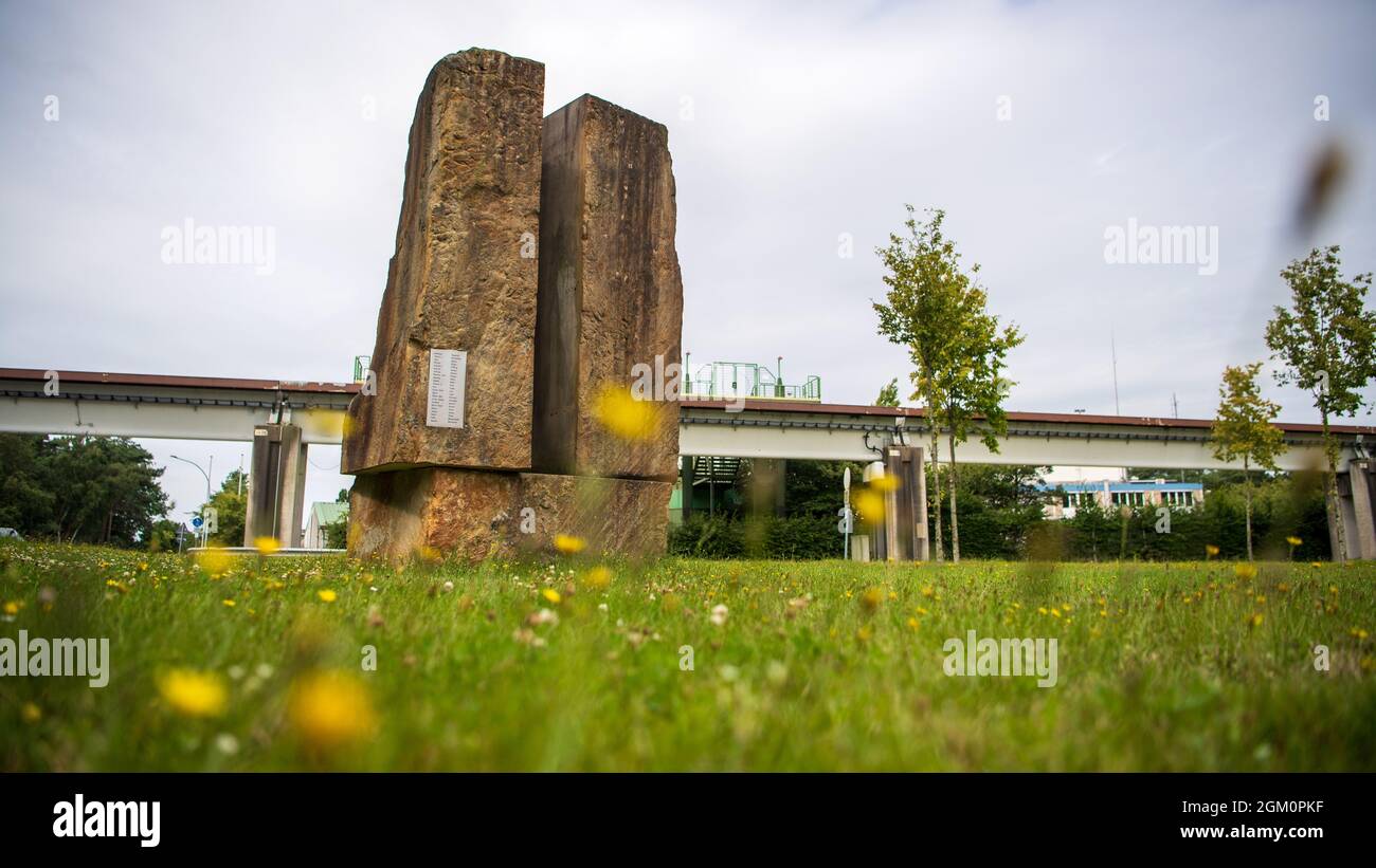 Lathen, Germany. 30th July, 2021. A memorial stone stands next to the ...