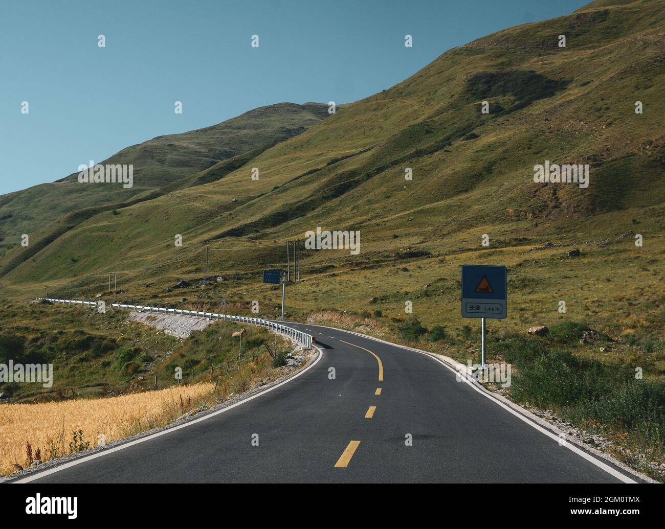Mountain highway of Tibetan Kham, China. Kham is the easternmost part ...
