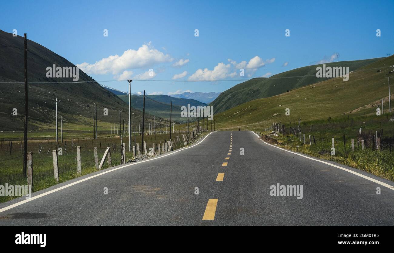 Mountain highway of Tibetan Kham, China. Kham is the easternmost part ...